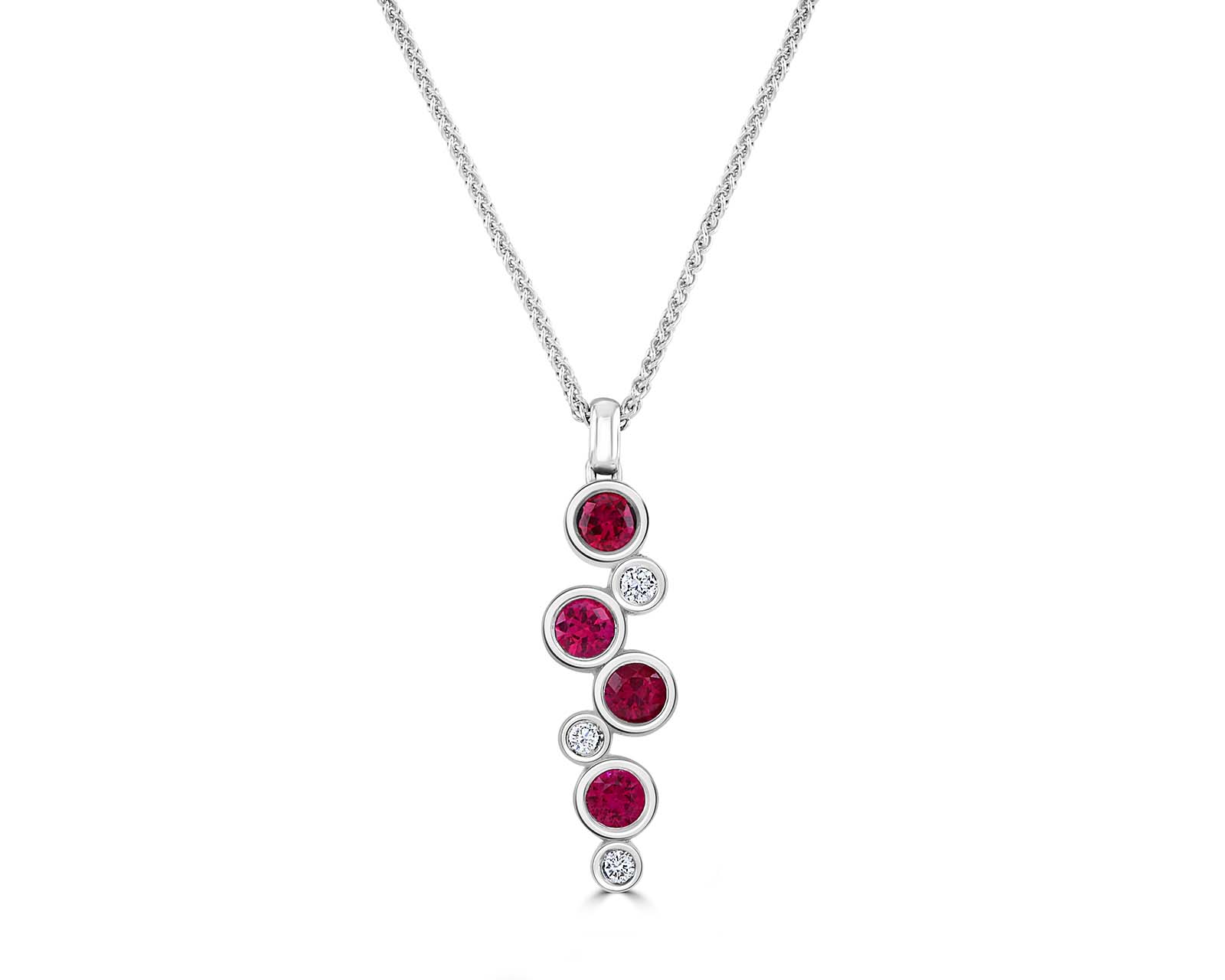 A Platinum Ruby and Diamond Pendant. - Jonathan Lambert